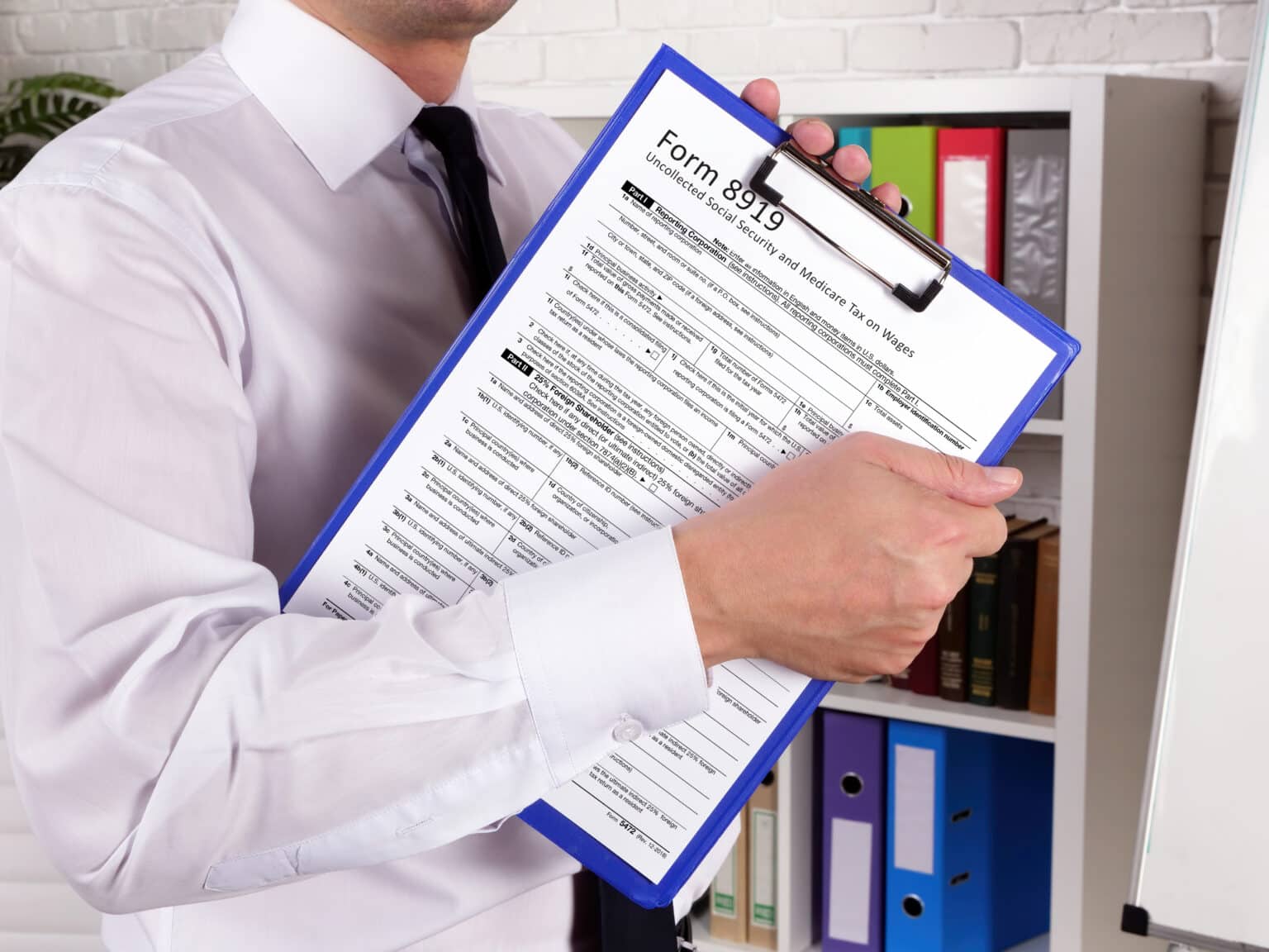IRS Form 8919 — How to Report Uncollected Taxes